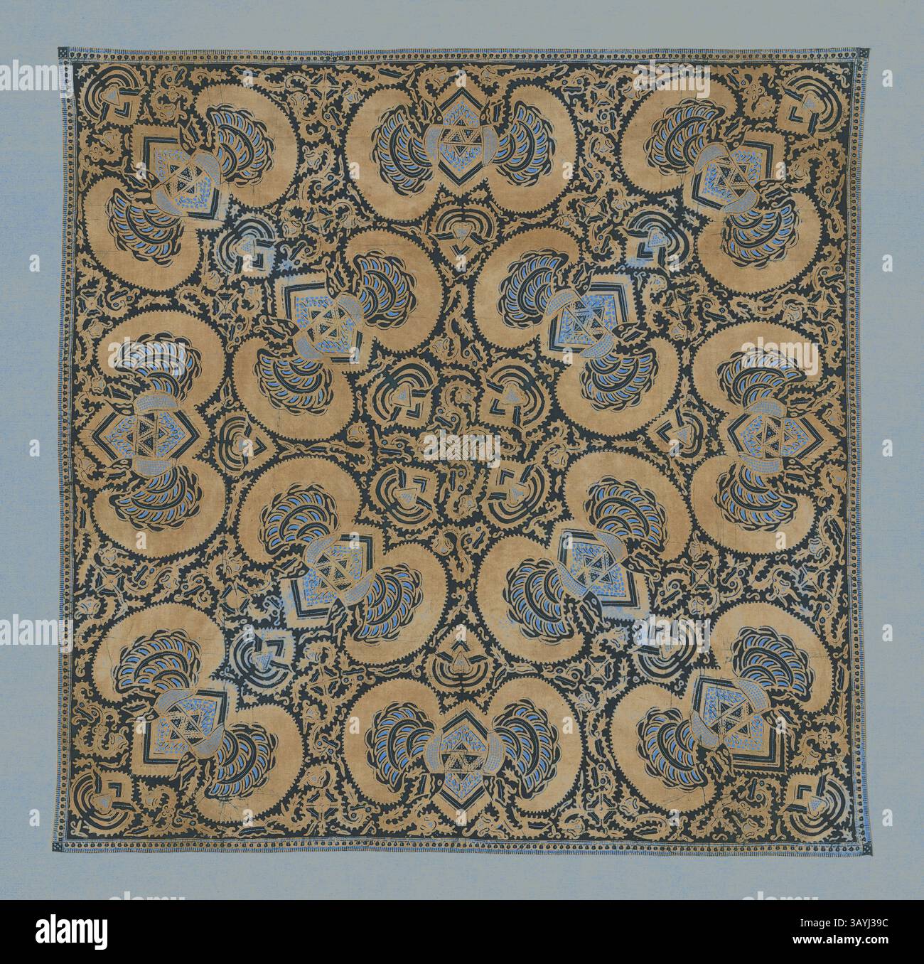 An intricate textile featuring a repeating pattern of stylized motifs ...