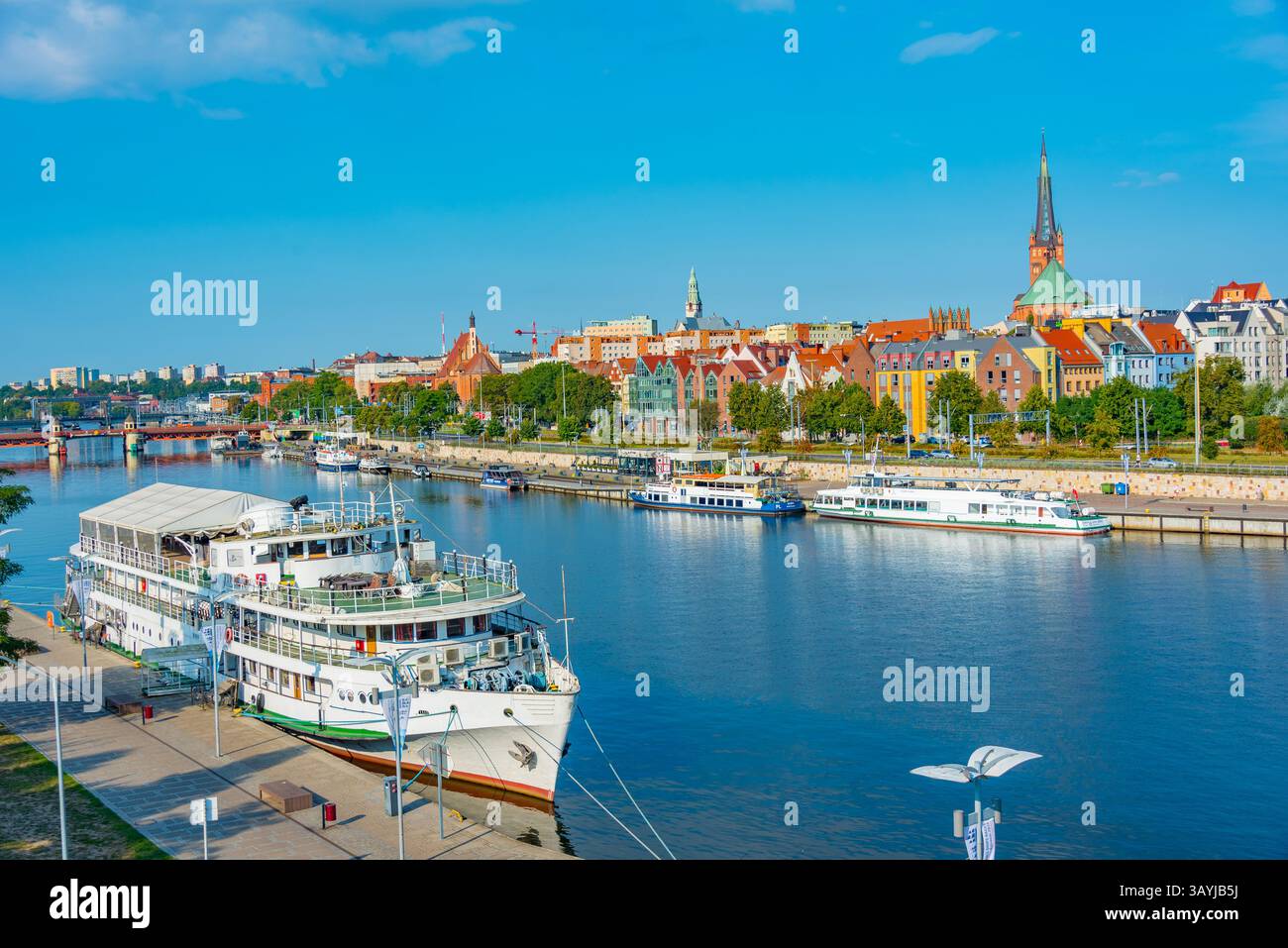 Sunrise view of waterfront of west oder river in szczecin, Poland.IMAGE ...