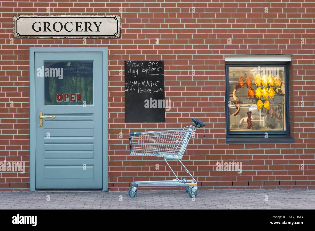 Facade with entrance of grocery store Stock Photo - Alamy