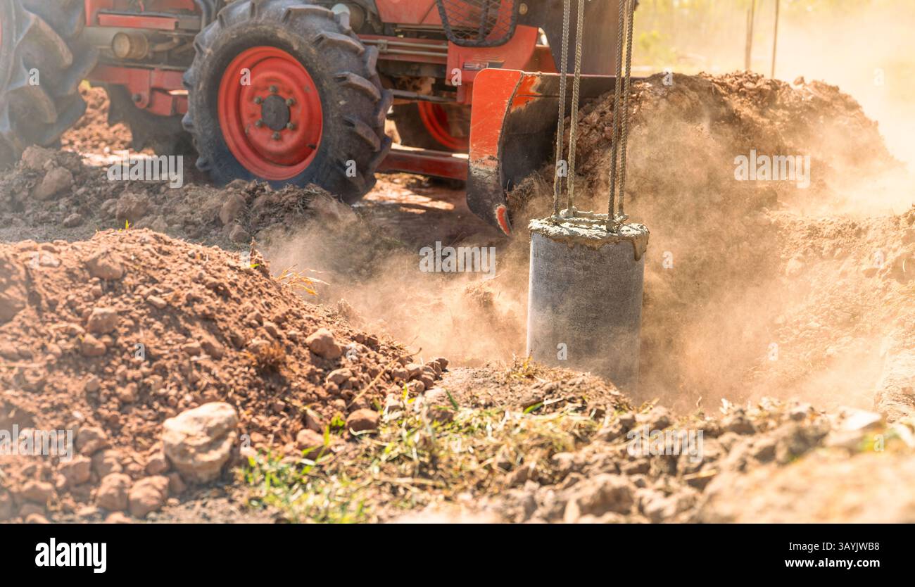 Construction tractor with specialized dozer blade pushing and grading ...