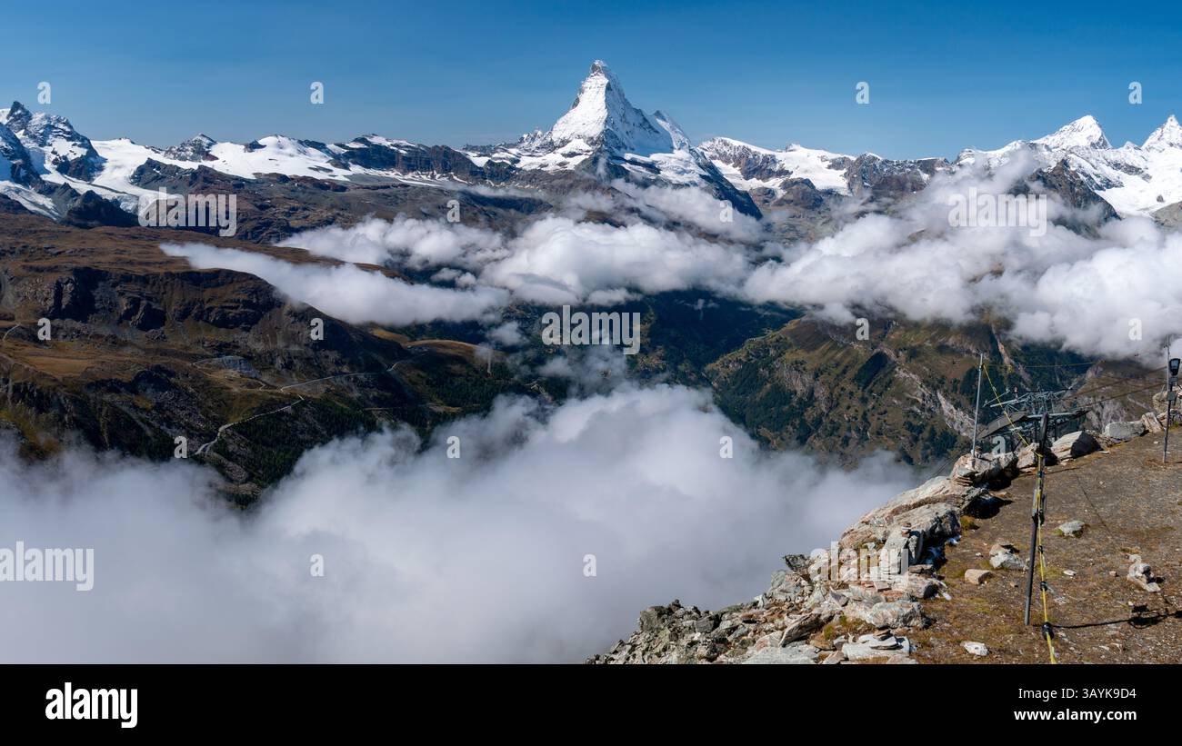 Spectacular view of the Matterhorn floating in the sea of clouds from ...