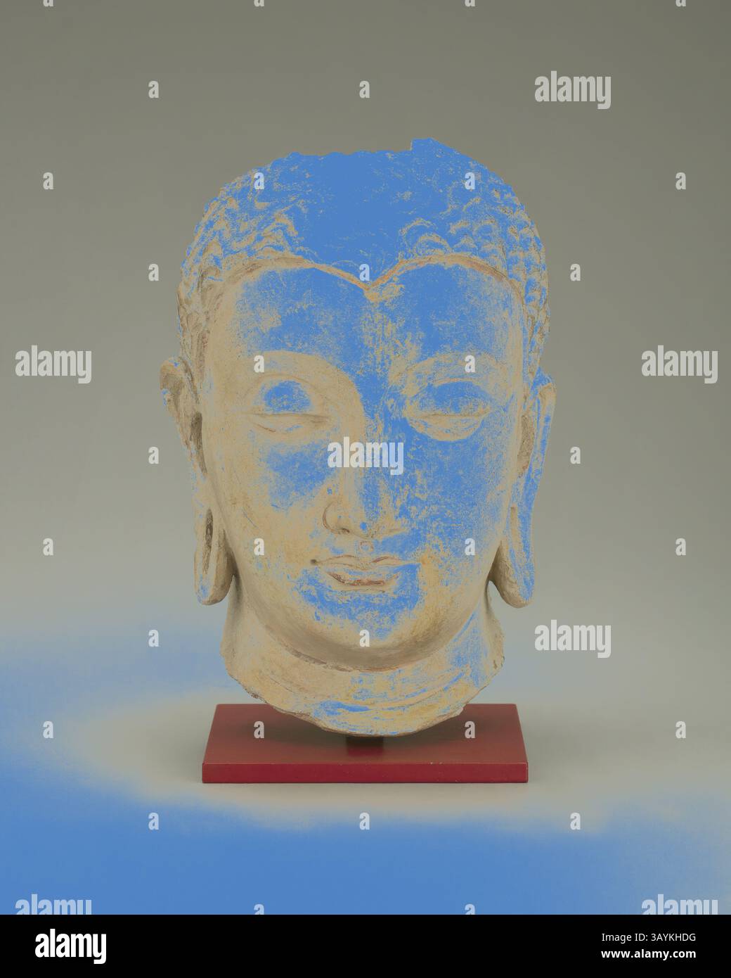 A serene Buddha head sculpture, showcasing intricate details in the ...