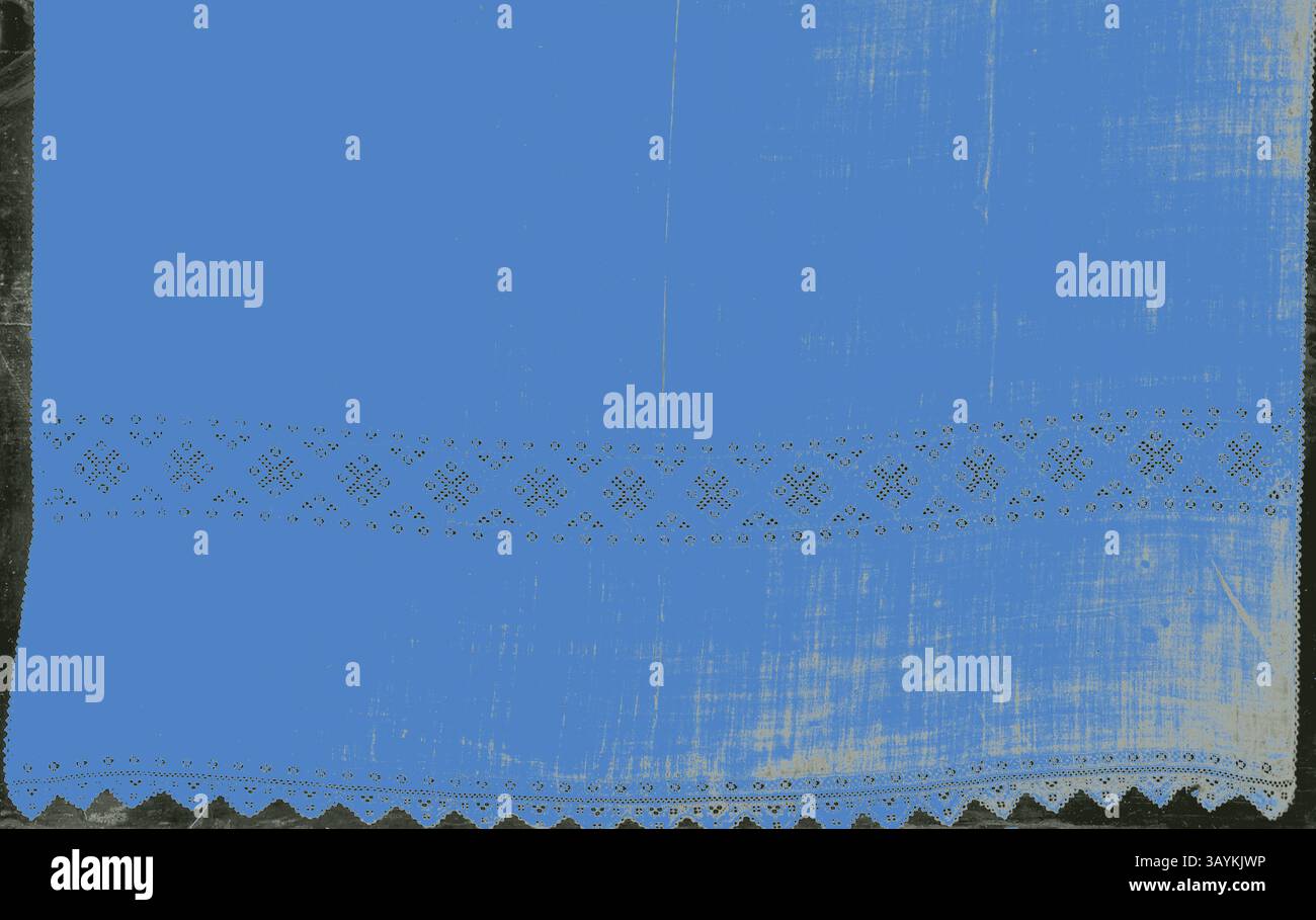 A vibrant blue textile features an intricate border design with ...