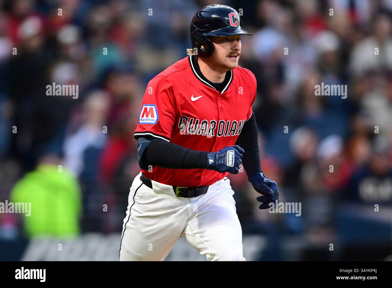Cleveland Guardians' Kyle Manzardo runs after hitting an RBI double ...