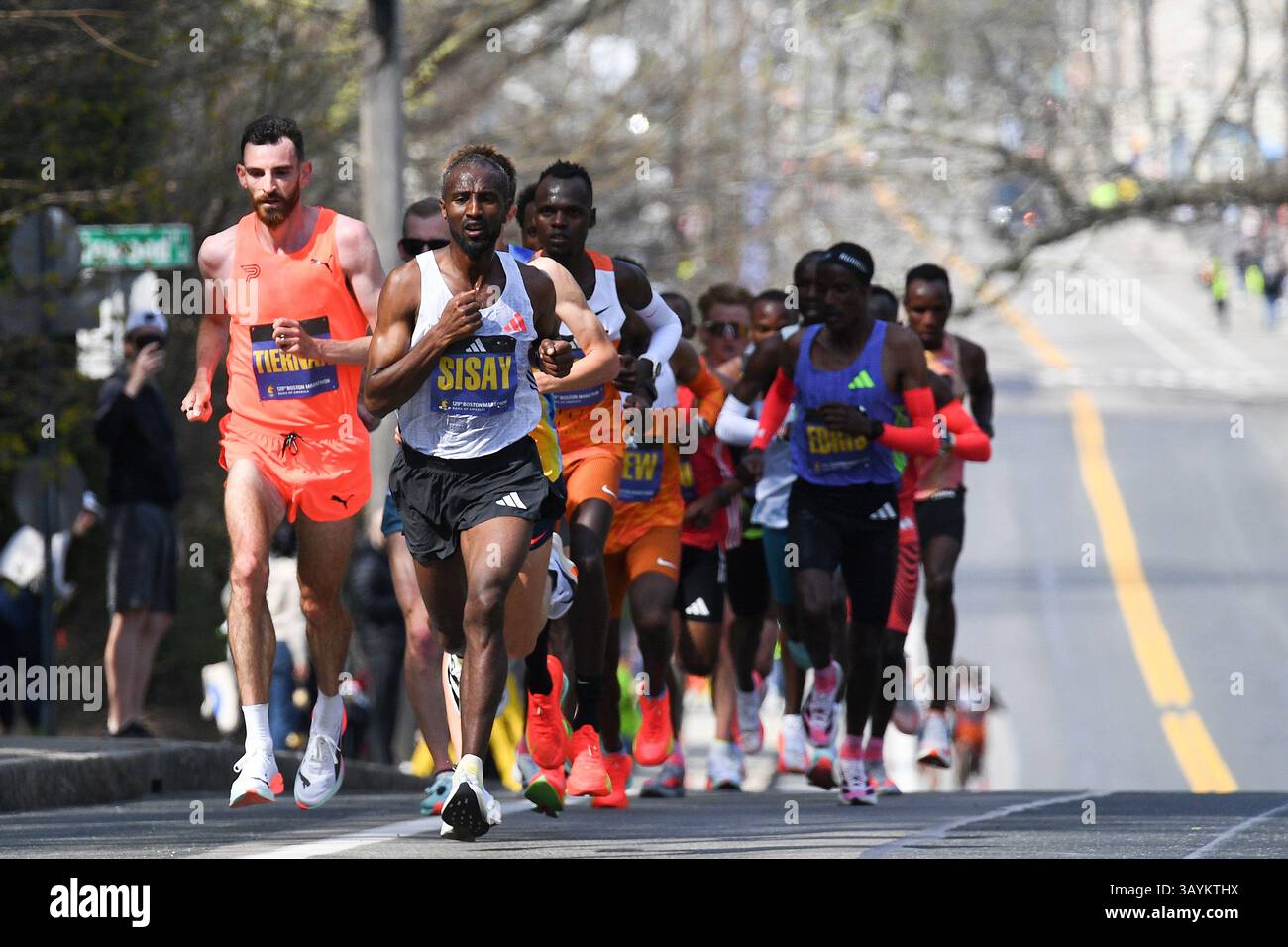 NATICK, MA - APRIL 21: Sisay Lemma of Ethiopia runs at the front of the ...