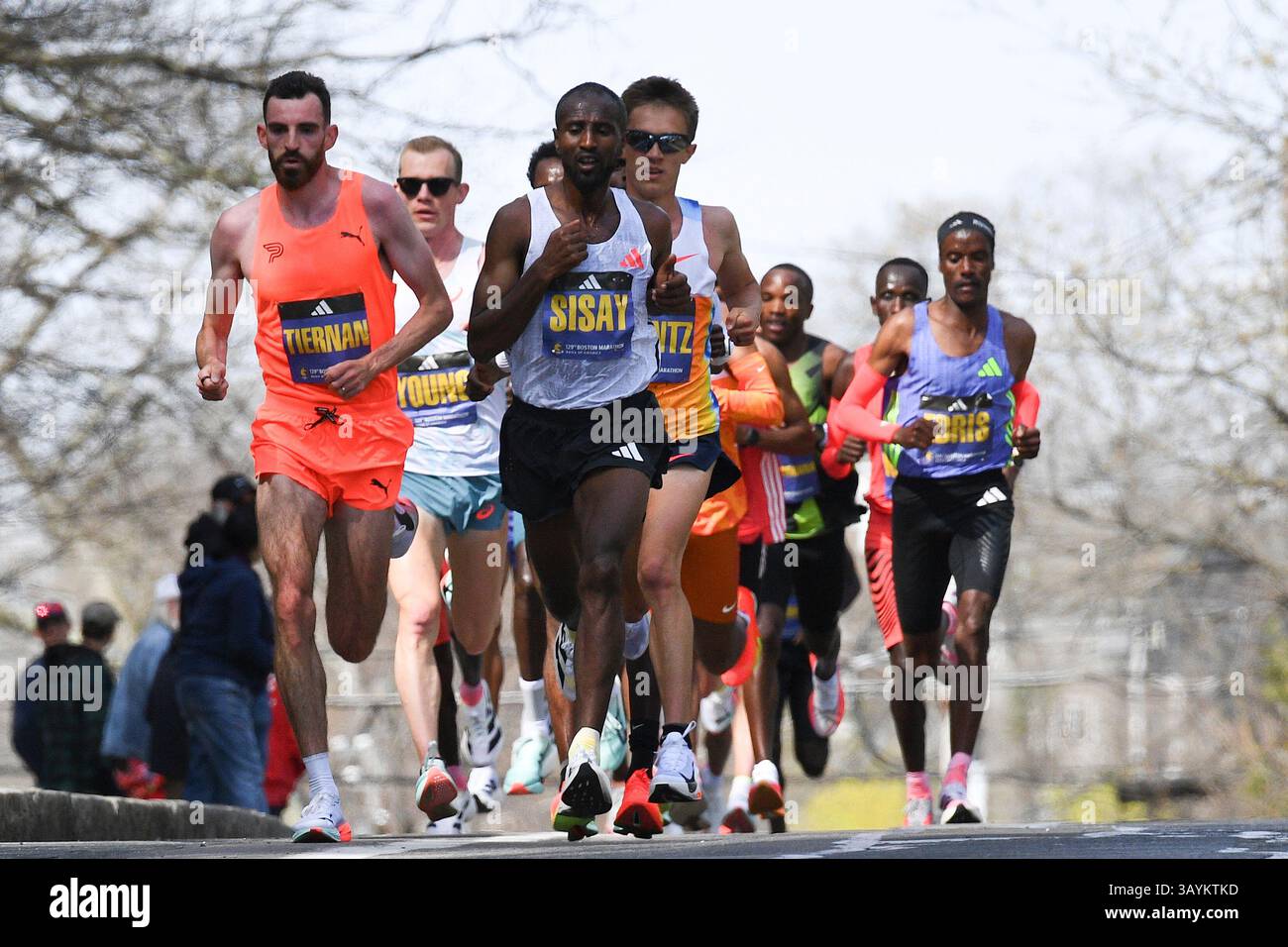 NATICK, MA - APRIL 21: Sisay Lemma of Ethiopia runs at the front of the ...
