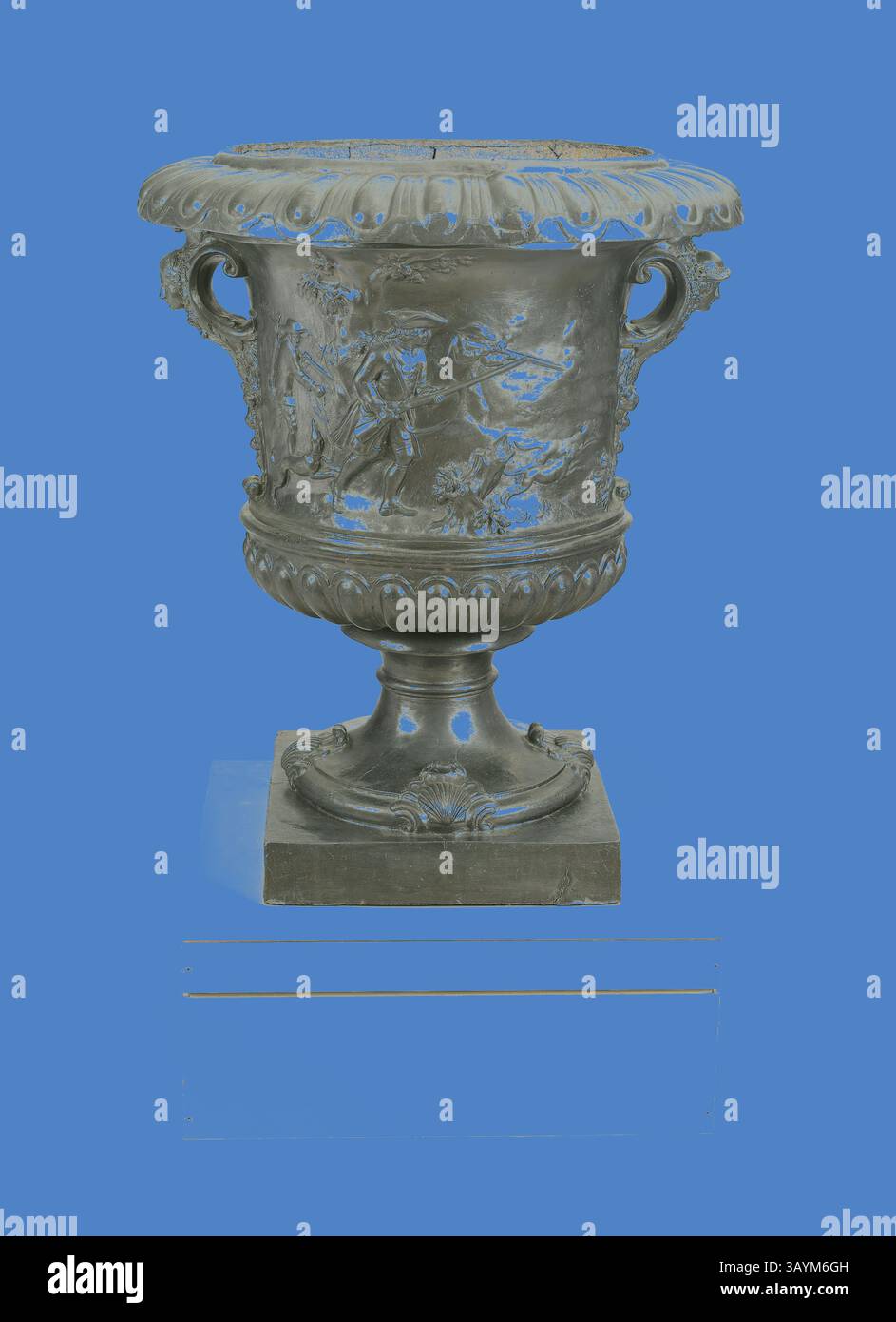 An ornate urn featuring intricate relief designs, showcasing scenes and ...