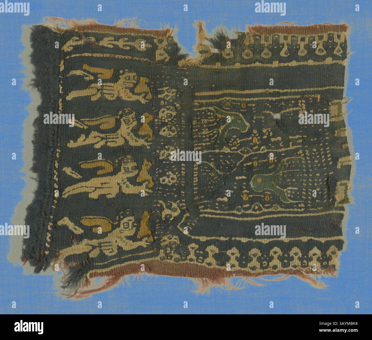 An intricate textile featuring detailed patterns, including ...