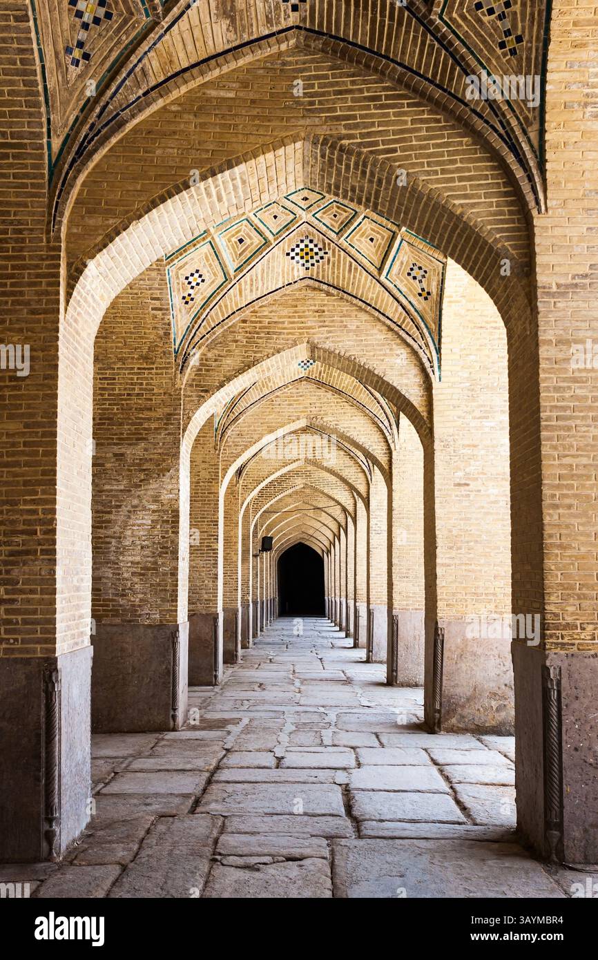 Persian architecture. Series of arcs in Iranian mosque. Vertical photo ...
