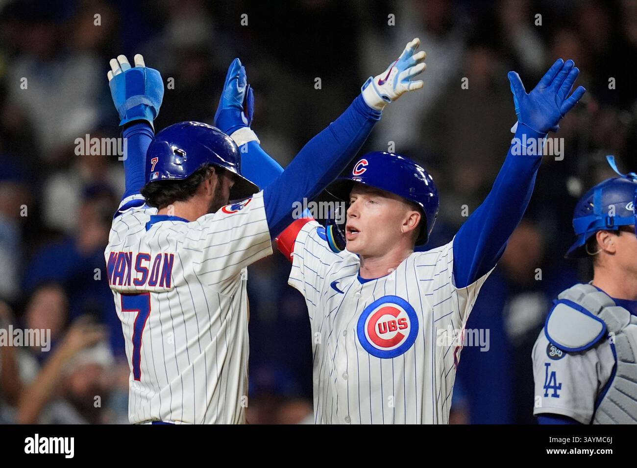 Chicago Cubs' Pete Crow-Armstrong (4), right, celebrates his two-run ...