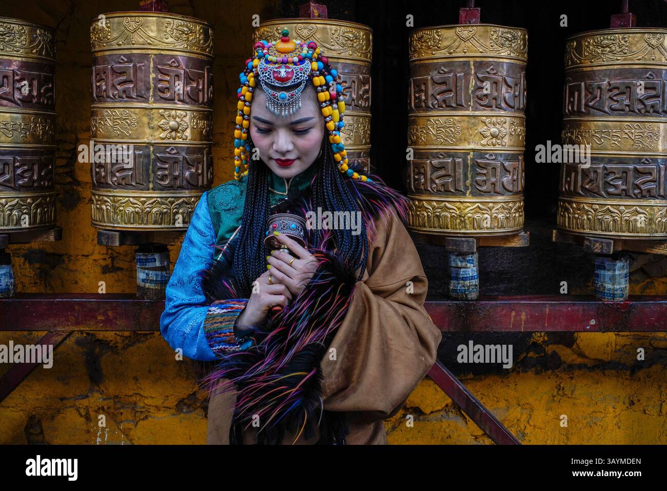 The act of spinning the wheel, known as mani khorlo, is a traditional ...