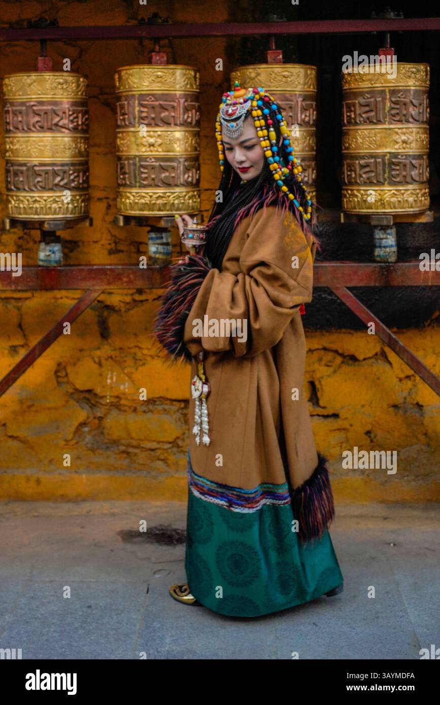 The act of spinning the wheel, known as mani khorlo, is a traditional ...