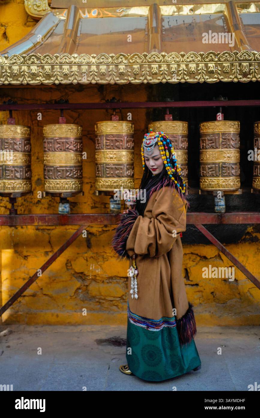 The act of spinning the wheel, known as mani khorlo, is a traditional ...