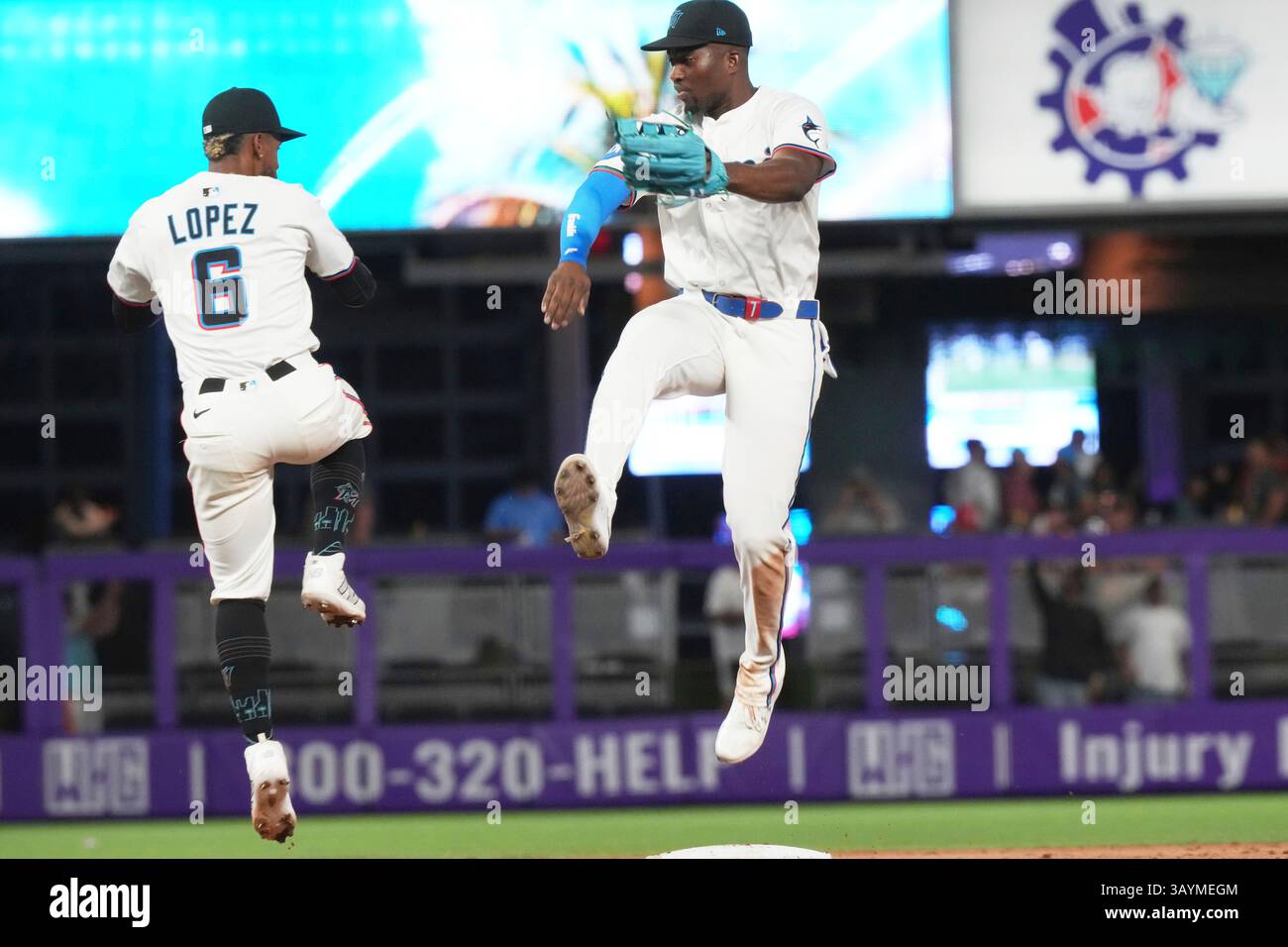 Miami Marlins second baseman Otto Lopez (6) and right fielder Jesus ...