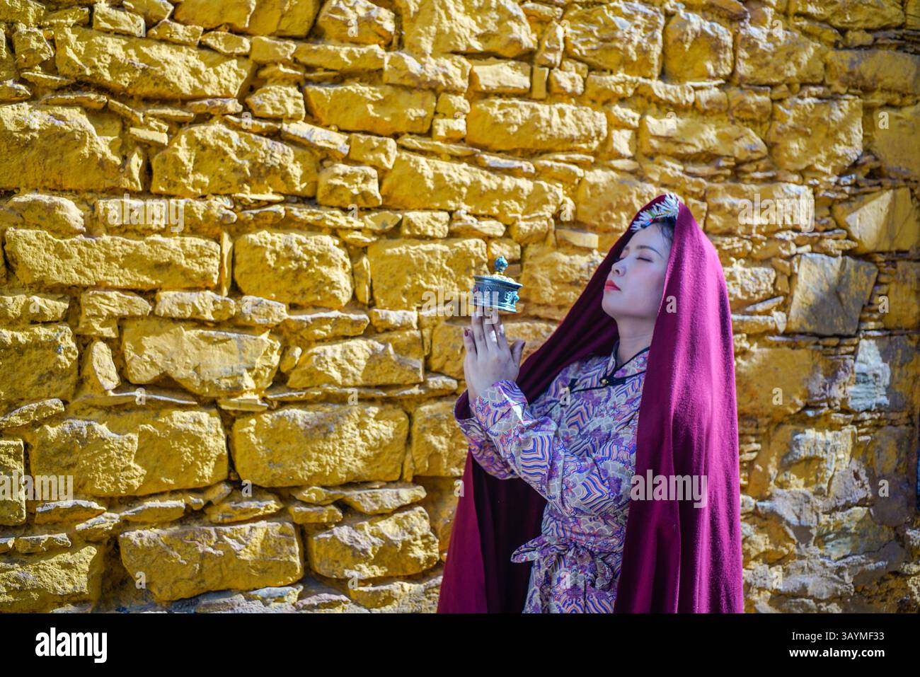 The act of spinning the wheel, known as mani khorlo, is a traditional ...