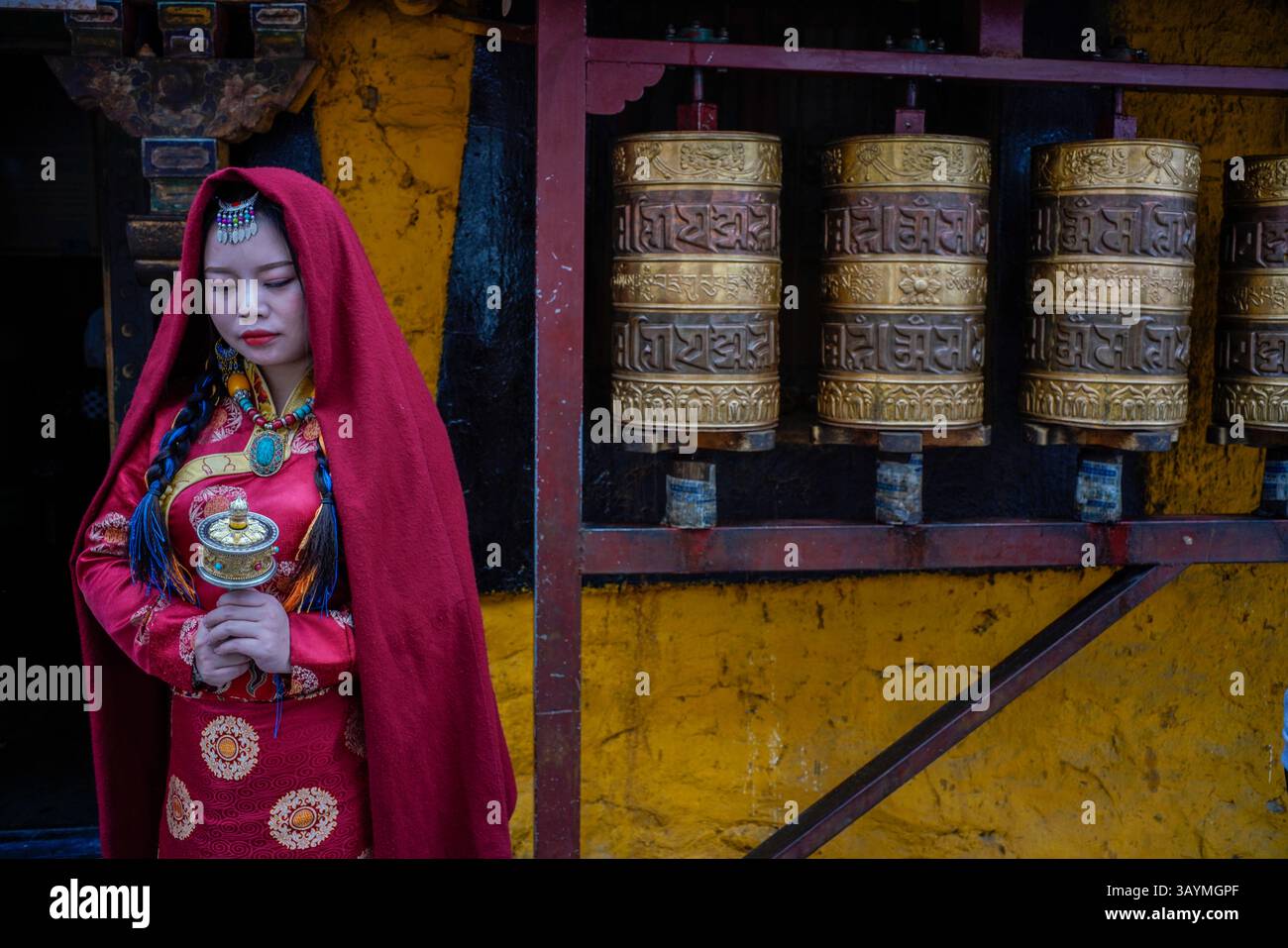 The act of spinning the wheel, known as mani khorlo, is a traditional ...