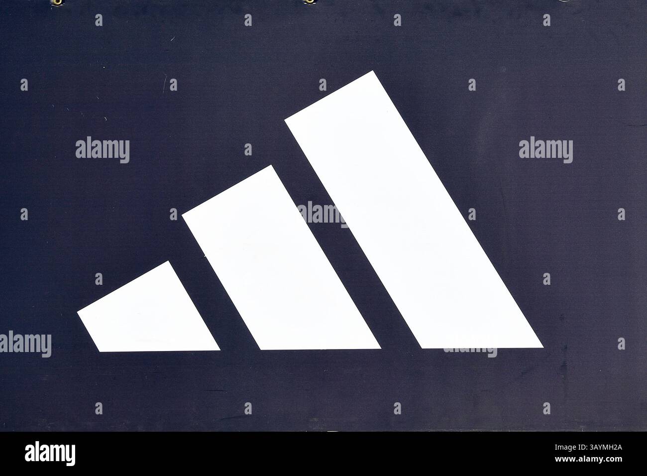 HOPKINTON, MA - APRIL 21: A detail view of the Adidas logo on a sign ...