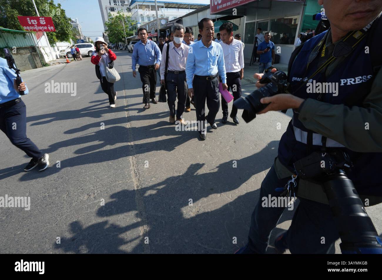 Cambodian prominent opposition politician Rong Chhun, front of a group ...