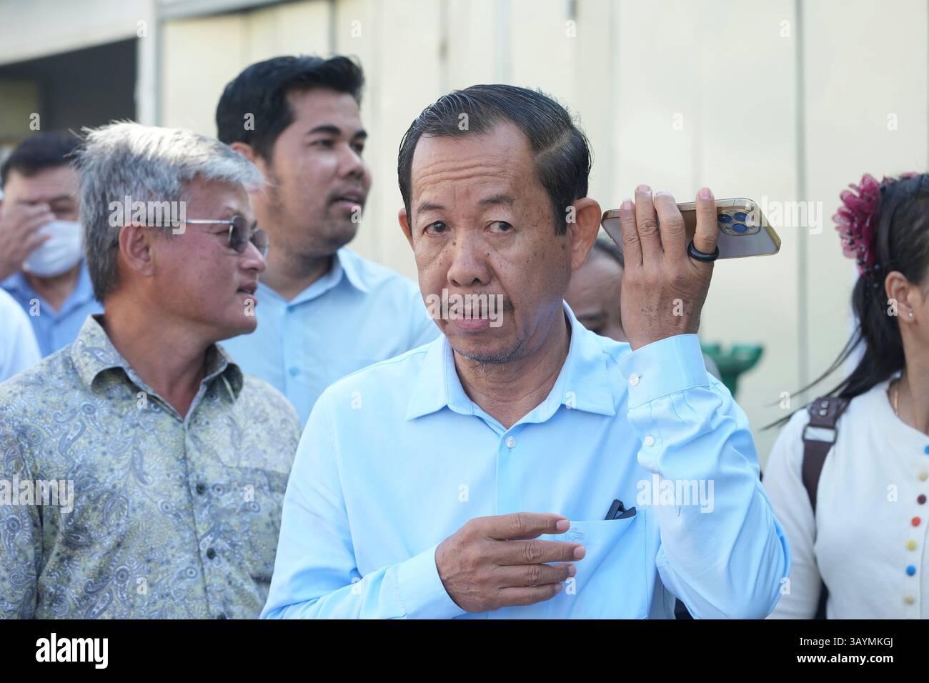 Cambodian prominent opposition politician Rong Chhun, foreground ...