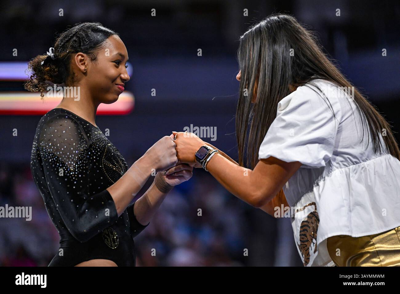 April 17, 2025, Fort Worth, US: Assistance Coach LACEY RUBIN fist bumps ...