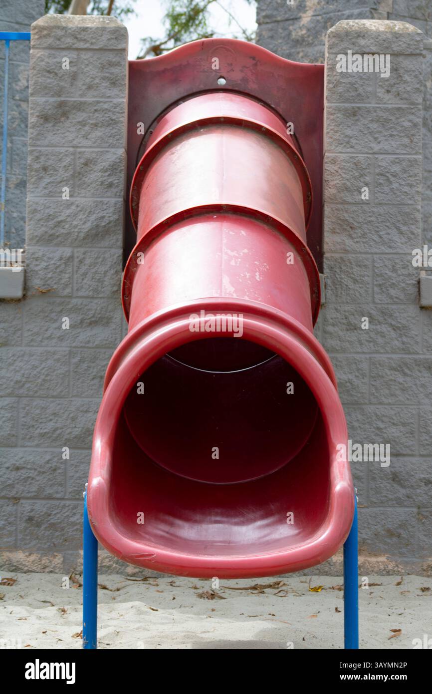 red slide at kids playground Stock Photo - Alamy