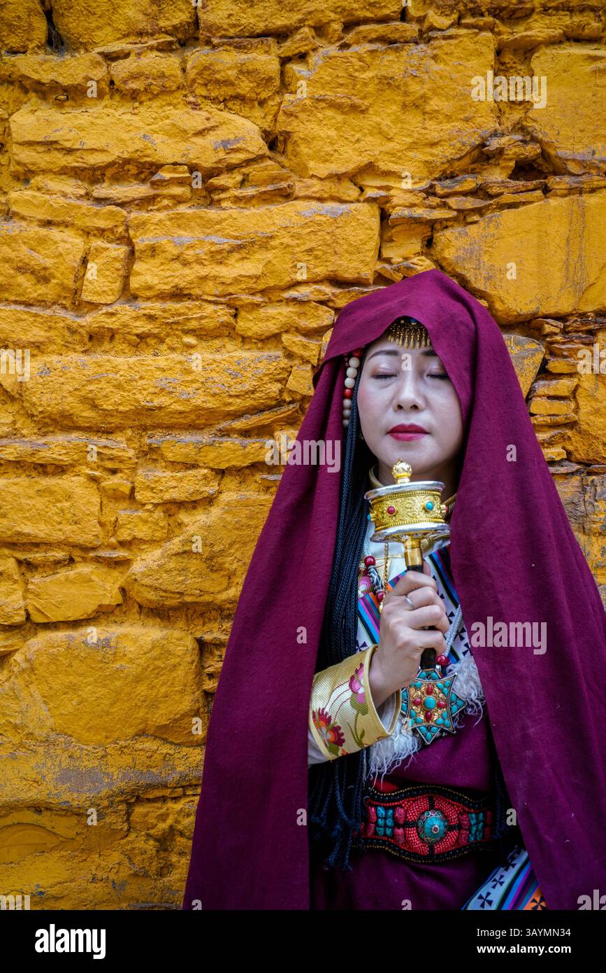 The act of spinning the wheel, known as mani khorlo, is a traditional ...