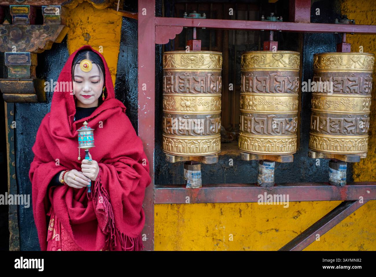 The act of spinning the wheel, known as mani khorlo, is a traditional ...