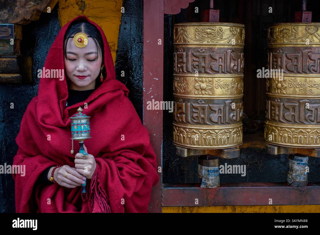 The act of spinning the wheel, known as mani khorlo, is a traditional ...
