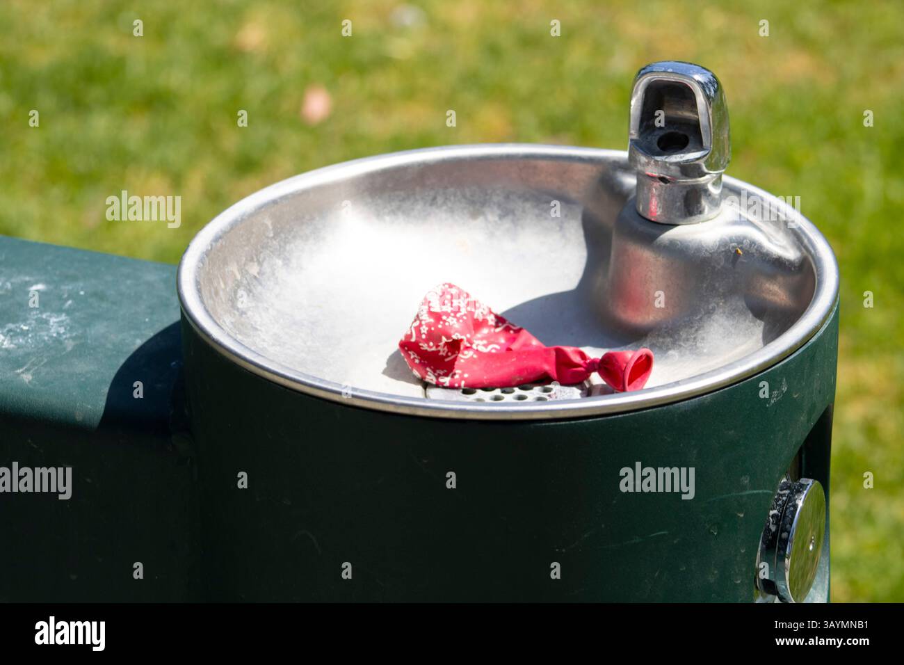 pink balloon plastic deflated remnants Stock Photo - Alamy