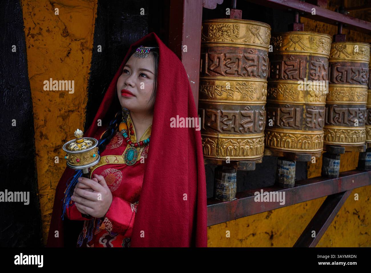 The act of spinning the wheel, known as mani khorlo, is a traditional ...