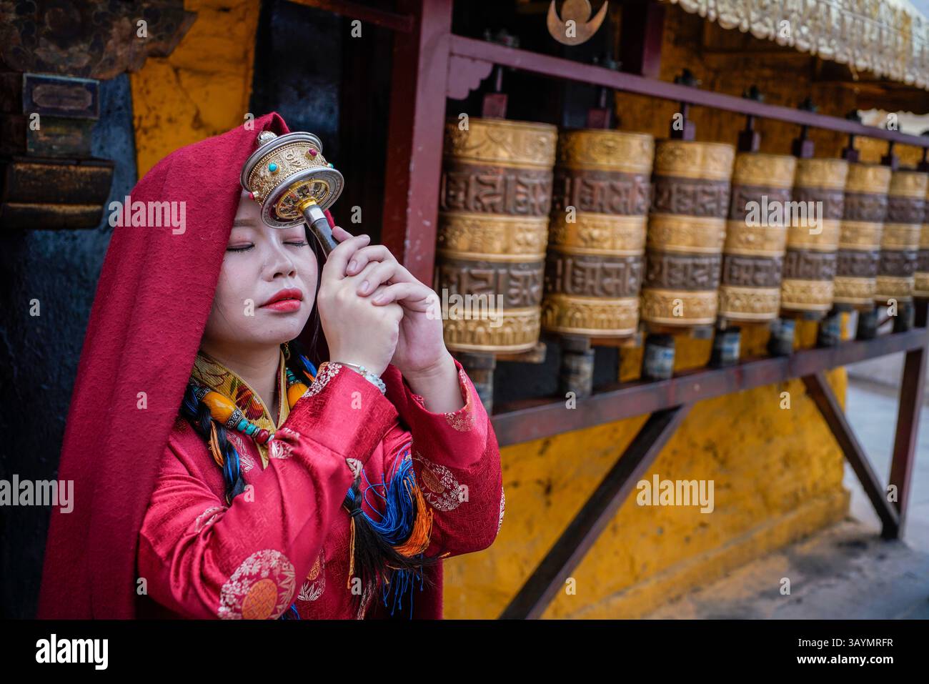 The act of spinning the wheel, known as mani khorlo, is a traditional ...