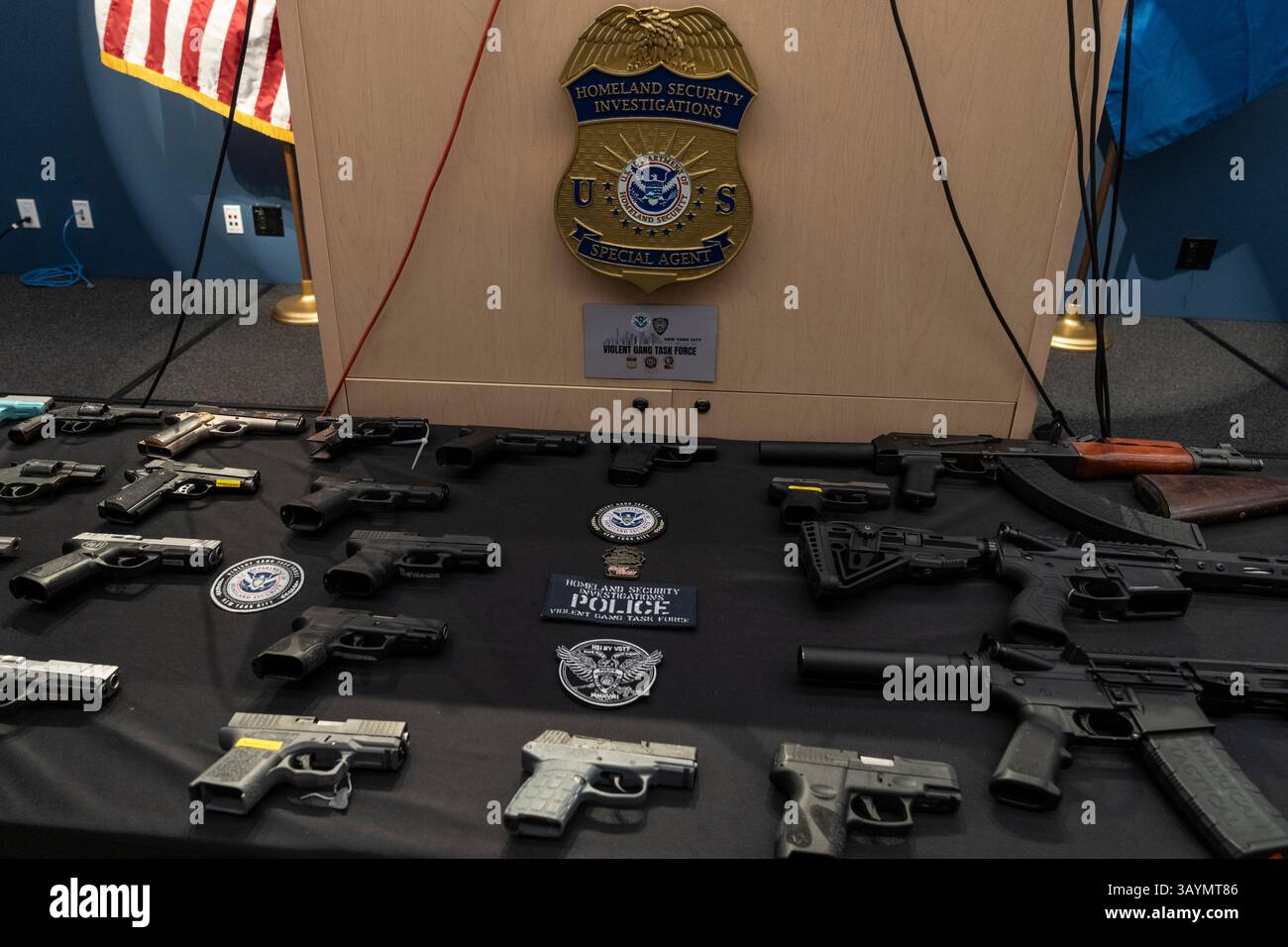 New York, USA. 23rd Apr, 2025. Confiscated guns on display during ...