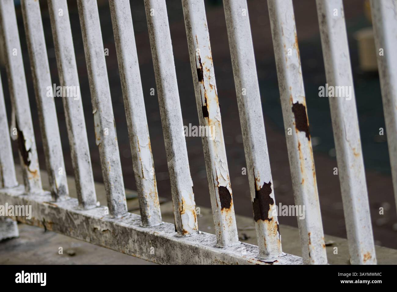 rusted metal fence with chipped white paint Stock Photo - Alamy