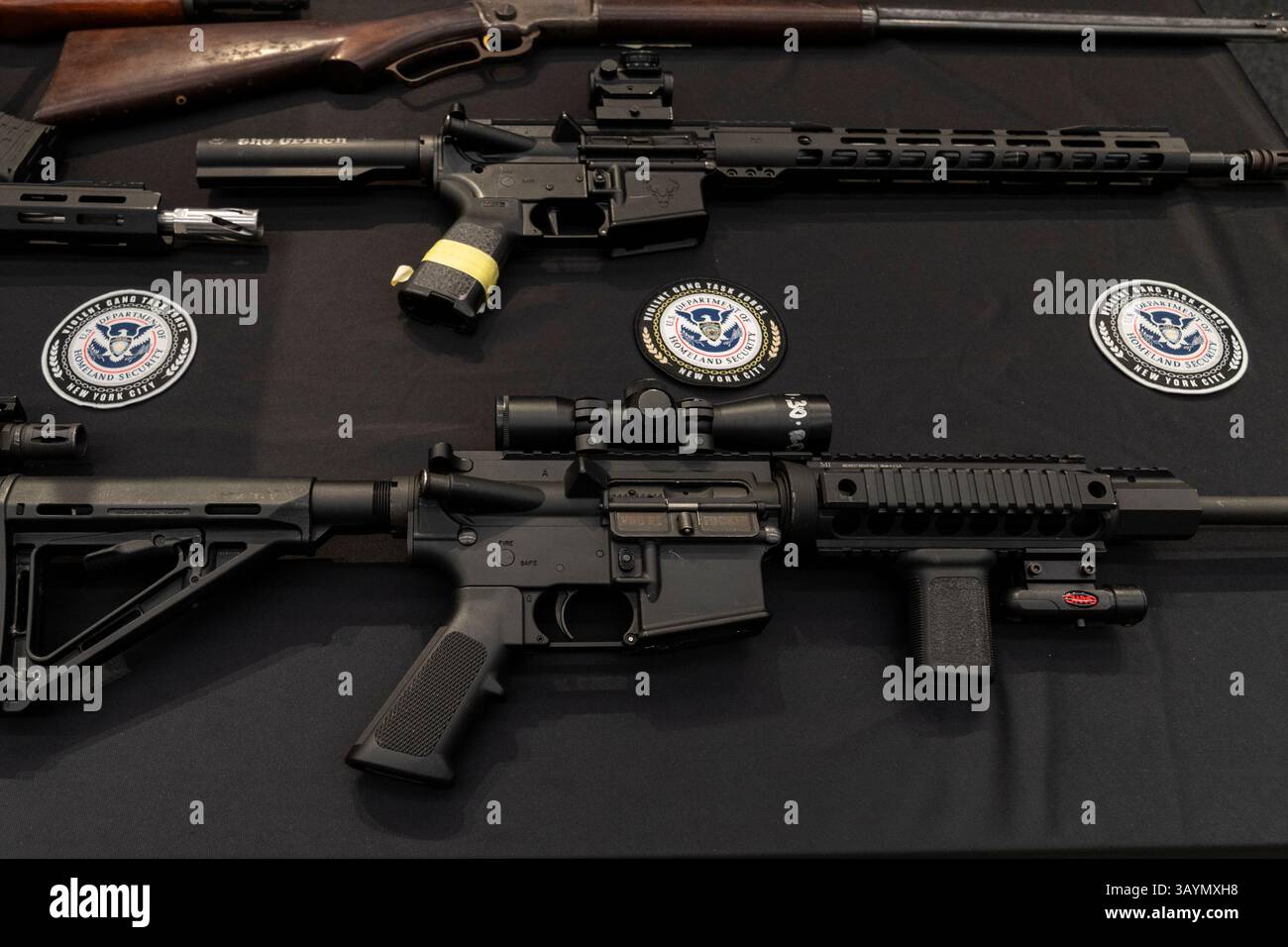 New York, NY, April 22, 2025: Confiscated guns on display during ...