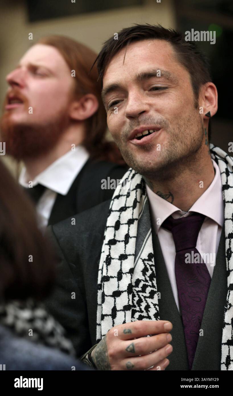 Manchester, UK. 22nd Apr, 2025. Drew (with keffiyeh around neck) and ...
