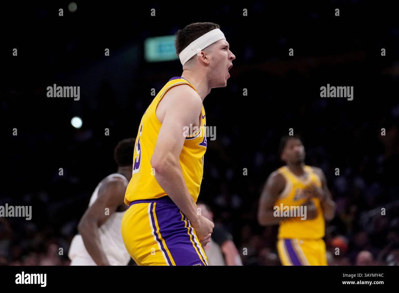Los Angeles Lakers guard Austin Reaves reacts after sinking a shot ...