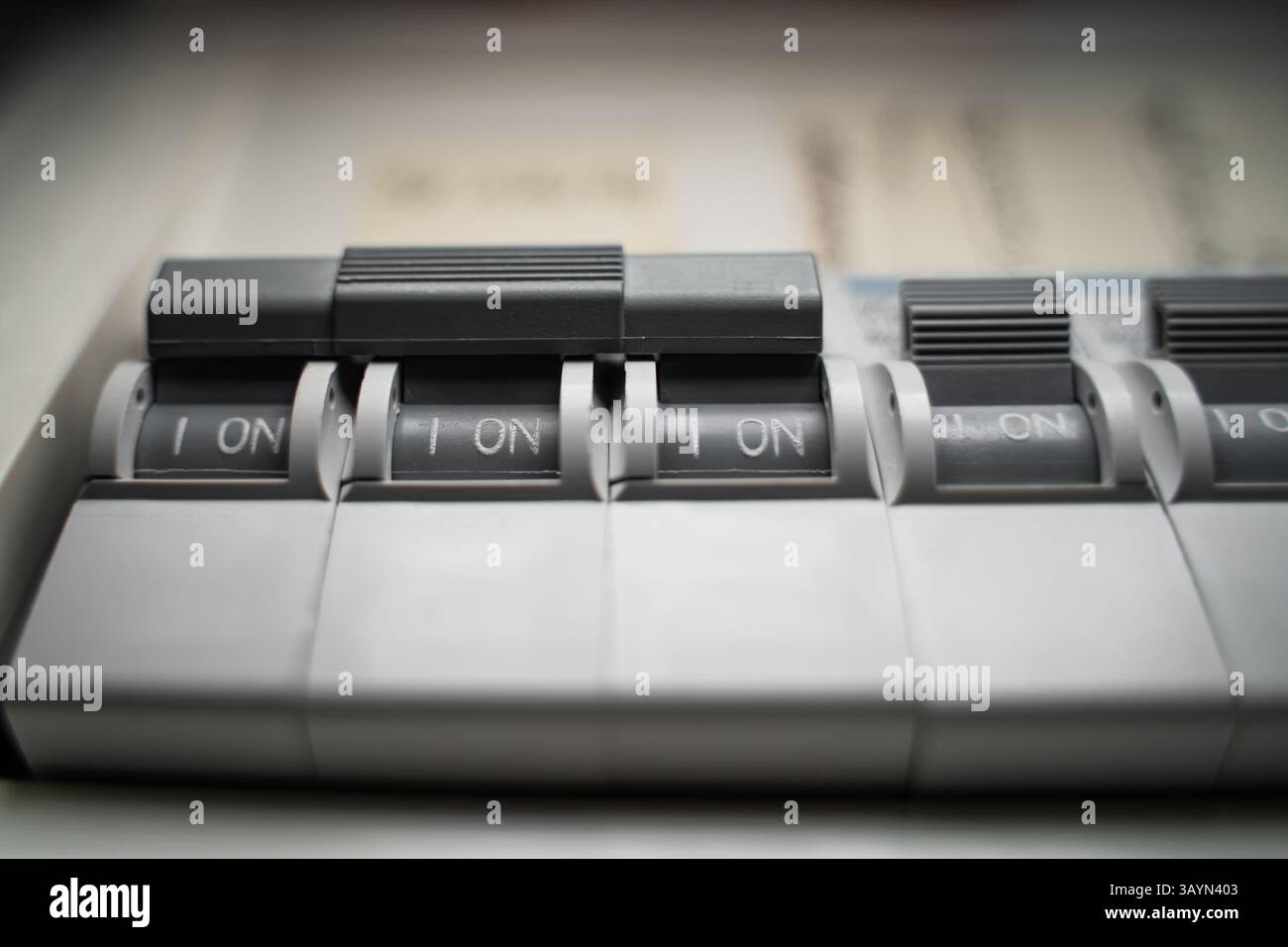 Close-up of a switchboard with a toggle switch turned on Stock Photo ...
