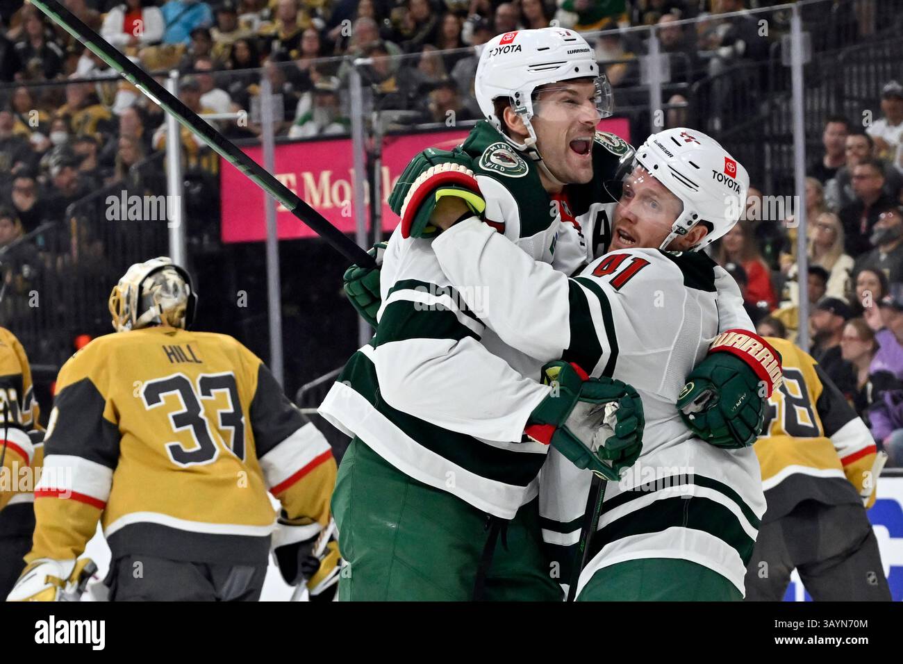 Minnesota Wild left wing Marcus Foligno, left, and center Gustav ...