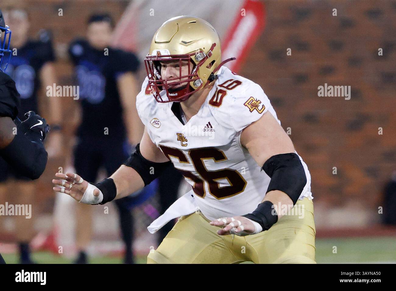 FILE - Boston College offensive lineman Drew Kendall (66) prepares to ...