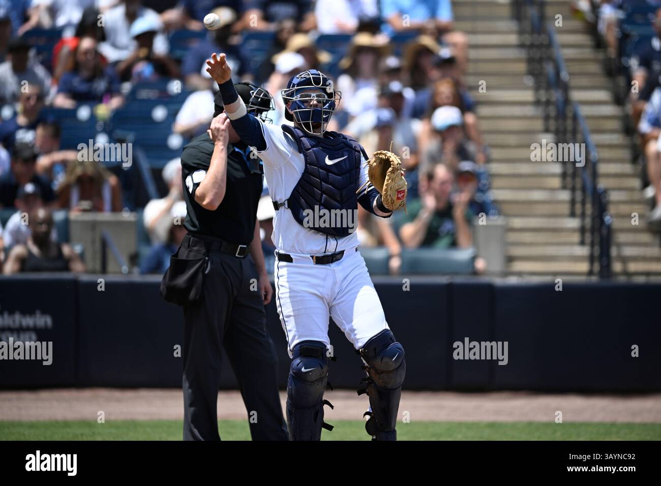 Tampa Bay Rays catcher Danny Jansen throws to first base after a ...