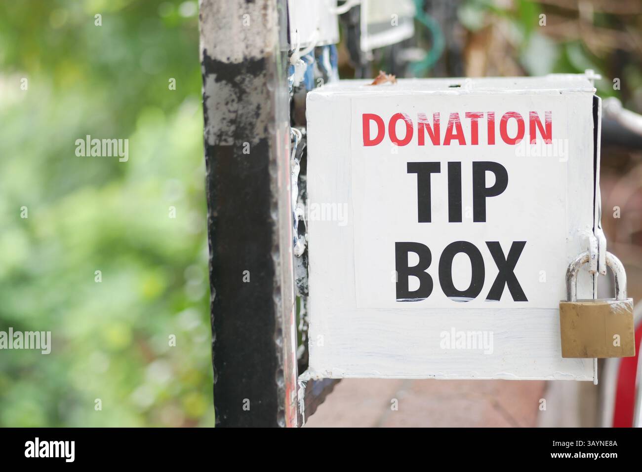 Community donation tip box inviting support for local initiatives Stock ...