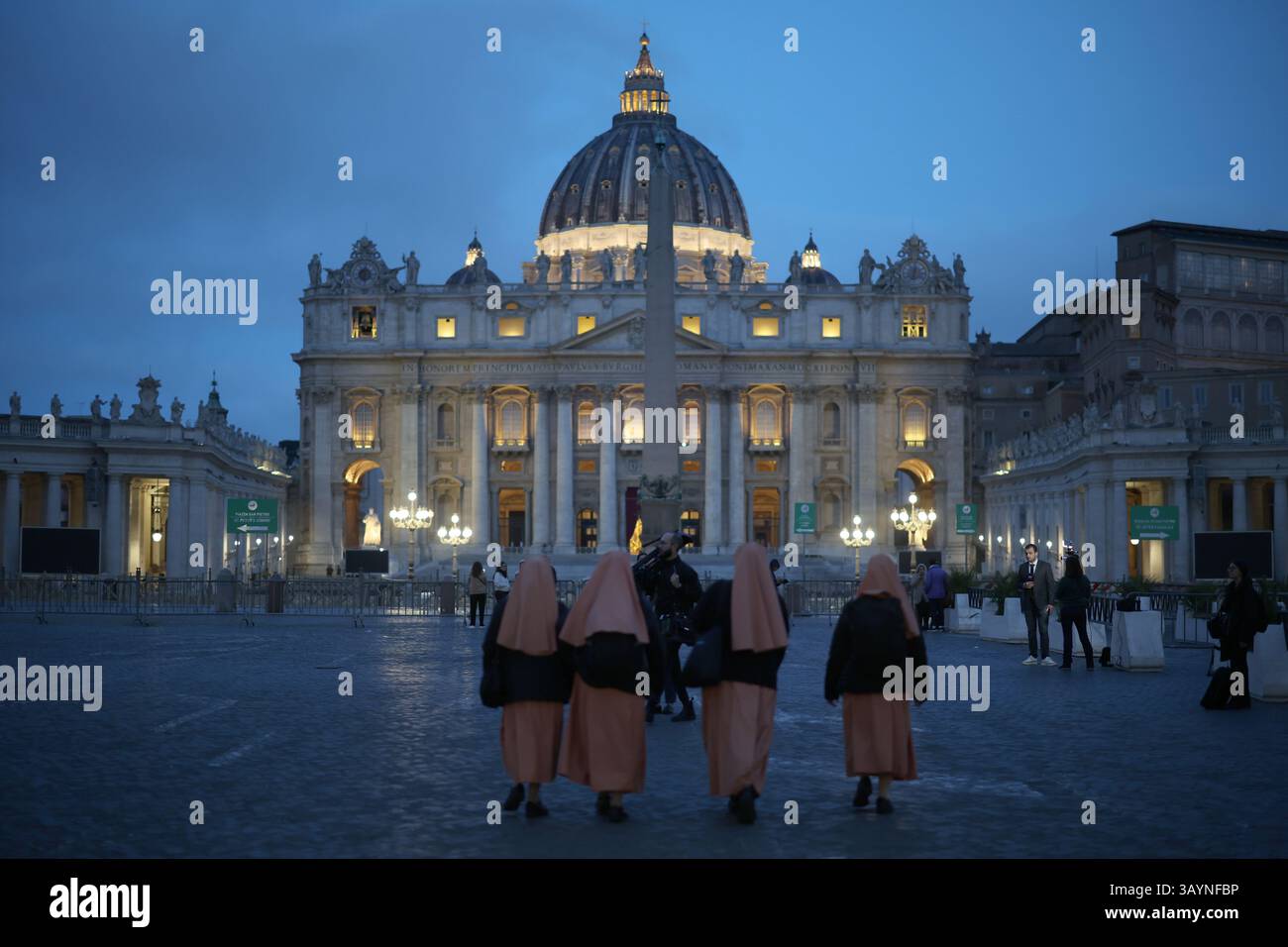 Vatican. 23rd Apr, 2025. The faithful walk across St. Peter's Square. They mourn the loss of ...