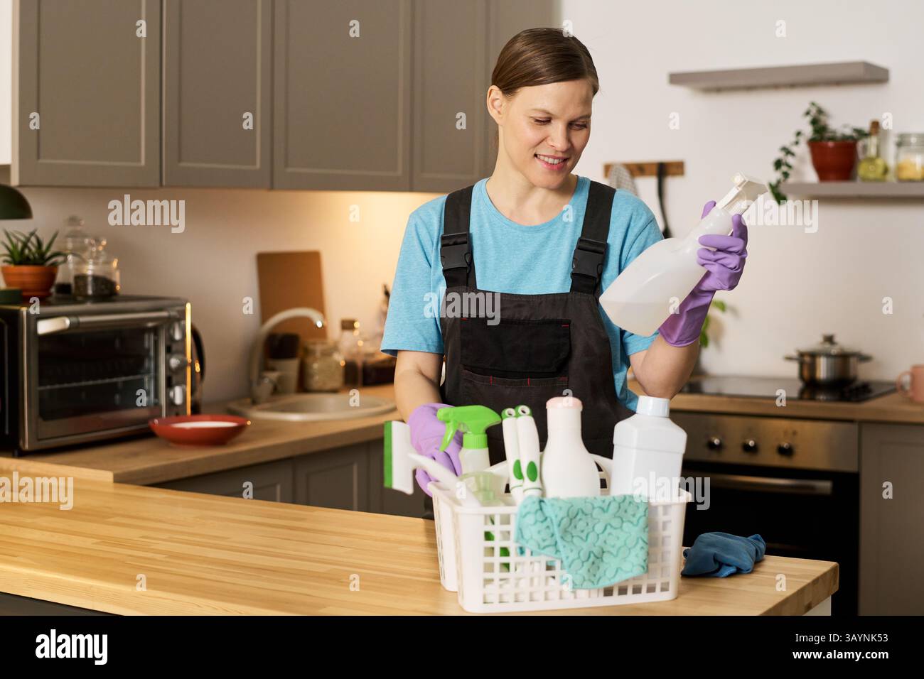 Cleaning Worker Using Professional Detergents Stock Photo - Alamy
