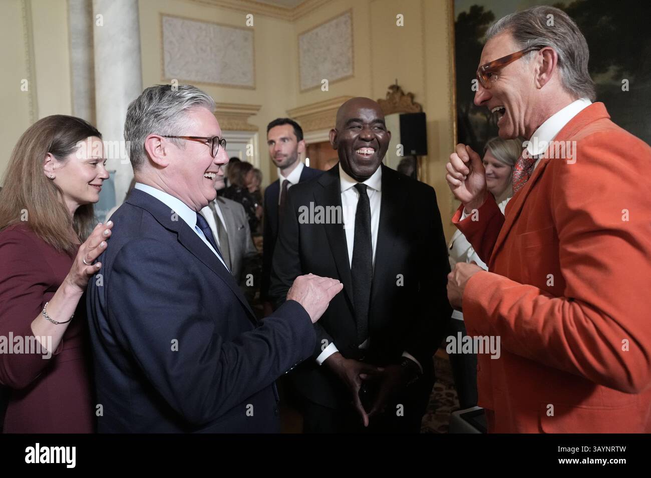 Prime Minister Sir Keir Starmer and wife Victoria Starmer speaking to ...