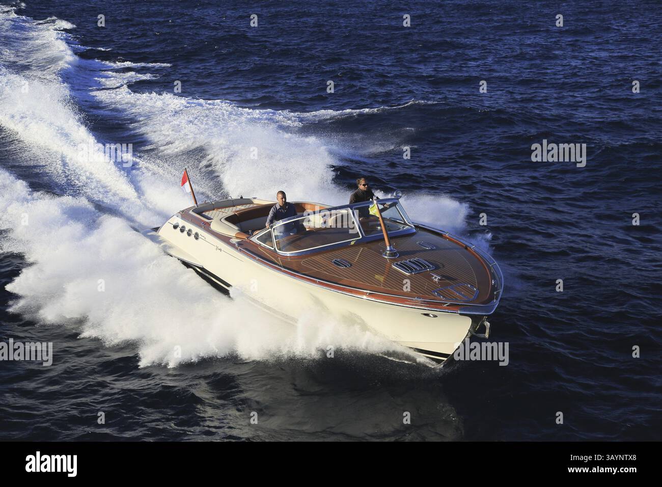Aerial view sports boat J Craft 42 Torpedo R at full speed on the Cote ...