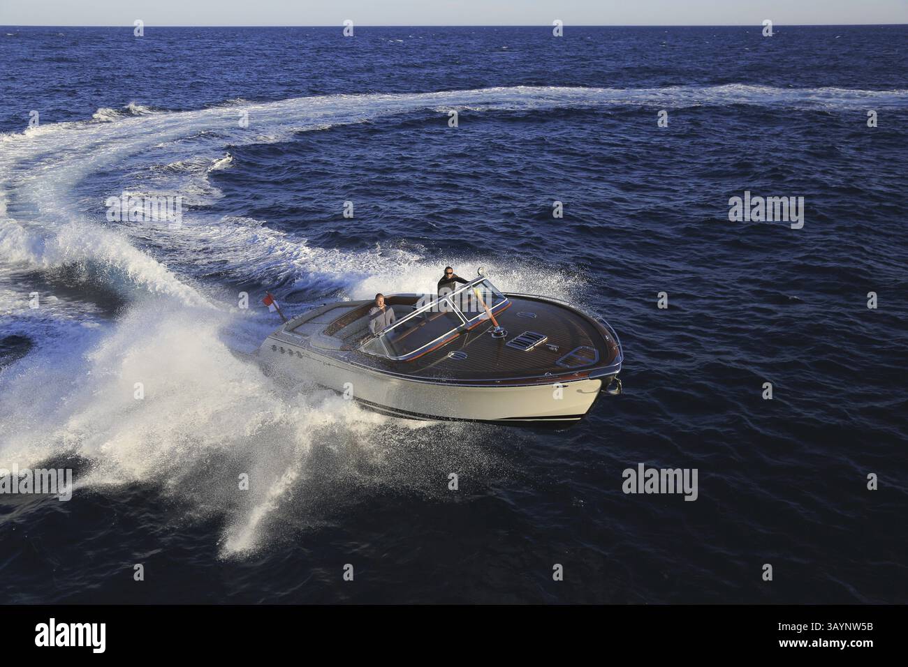 Aerial view sports boat J Craft 42 Torpedo R at full speed on the Cote ...