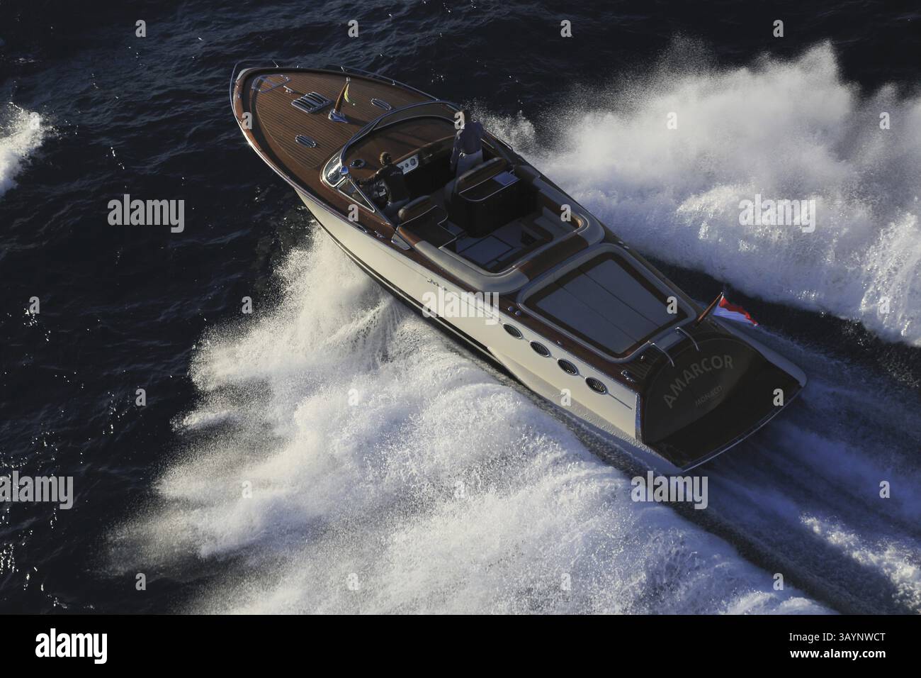 Aerial view sports boat J Craft 42 Torpedo R at full speed on the Cote ...