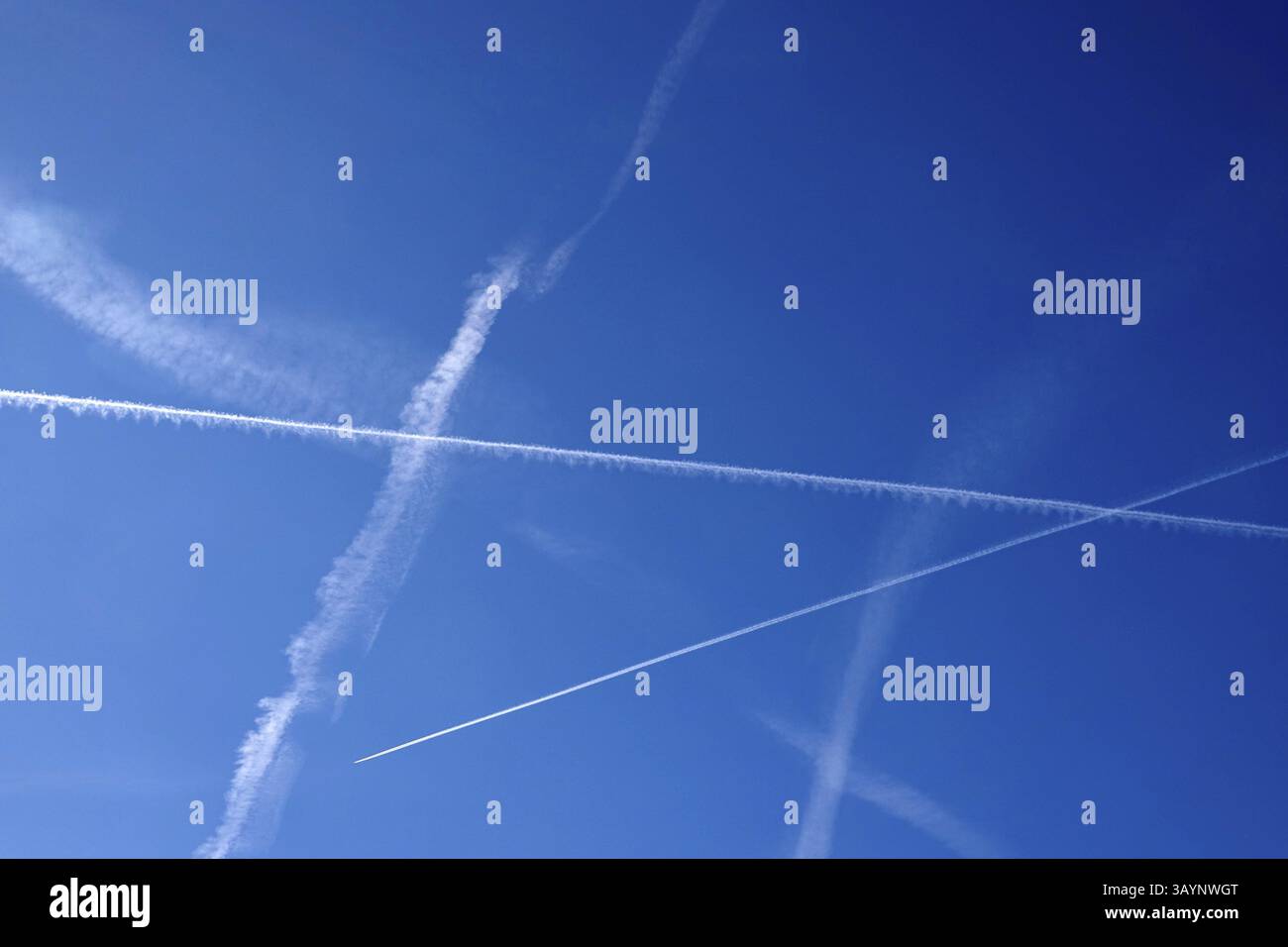 Condensation trails, Germany, Europe Stock Photo - Alamy