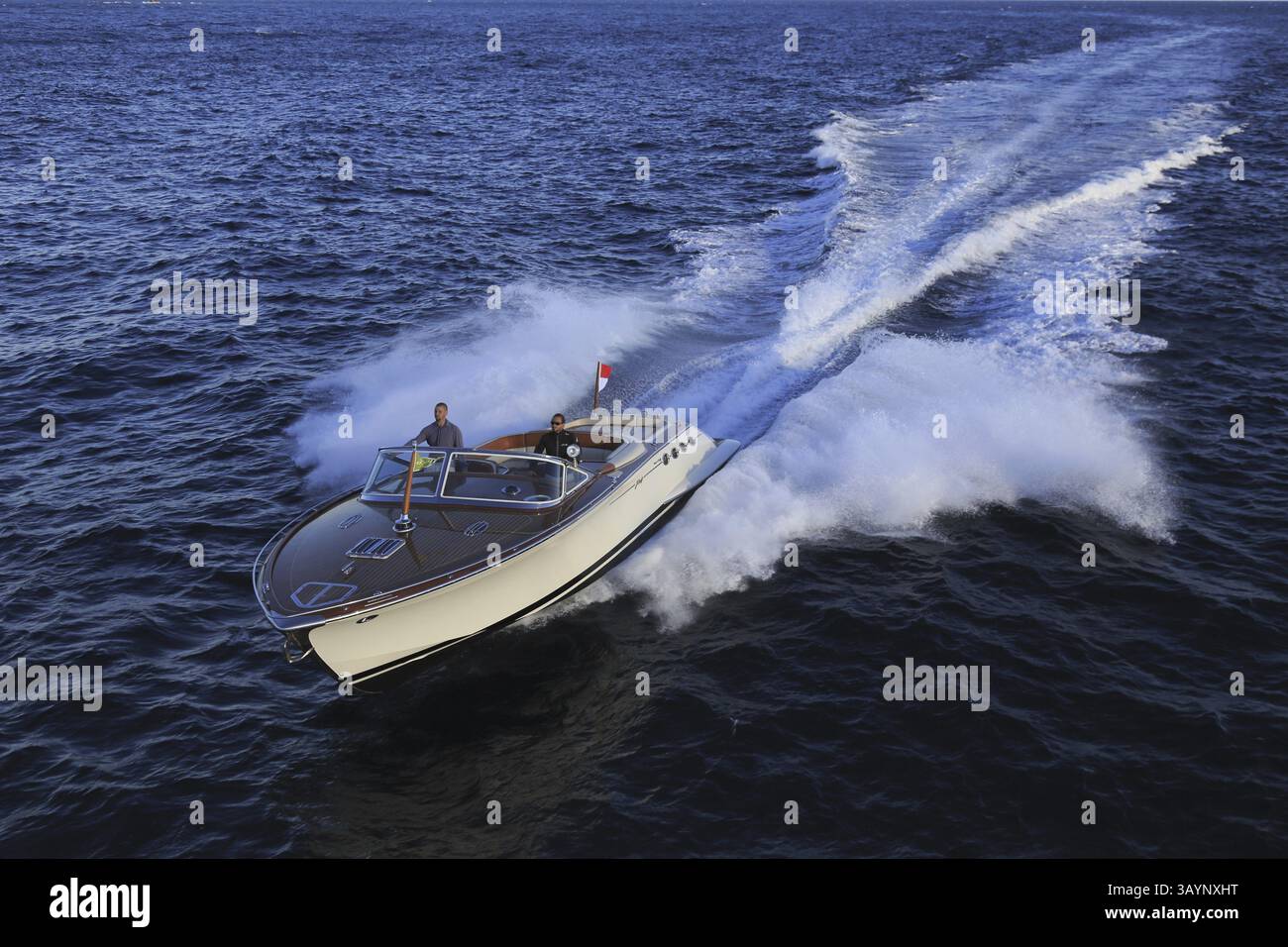 Aerial view sports boat J Craft 42 Torpedo R at full speed on the Cote ...