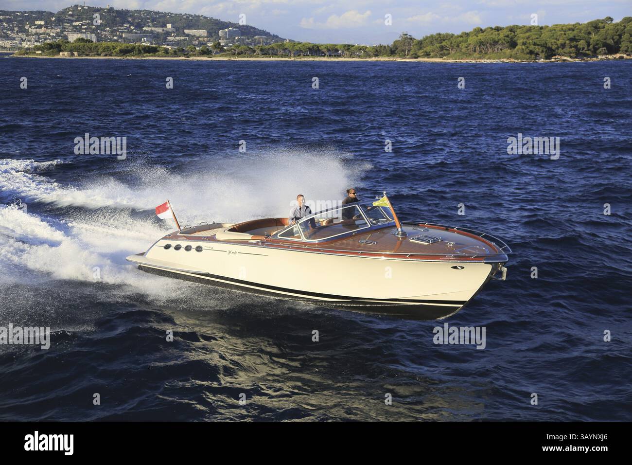 Aerial view sports boat J Craft 42 Torpedo R at full speed on the Cote ...